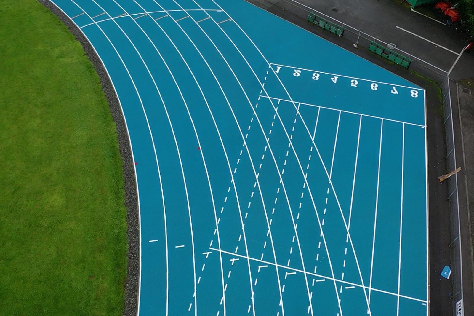 Installing a new running track for Claremont Stadium - US